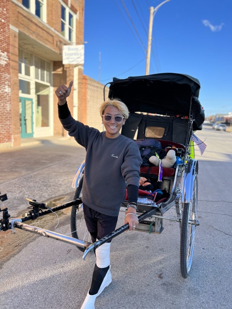 Man running cross-country with a rickshaw strolls through Sapulpa ...