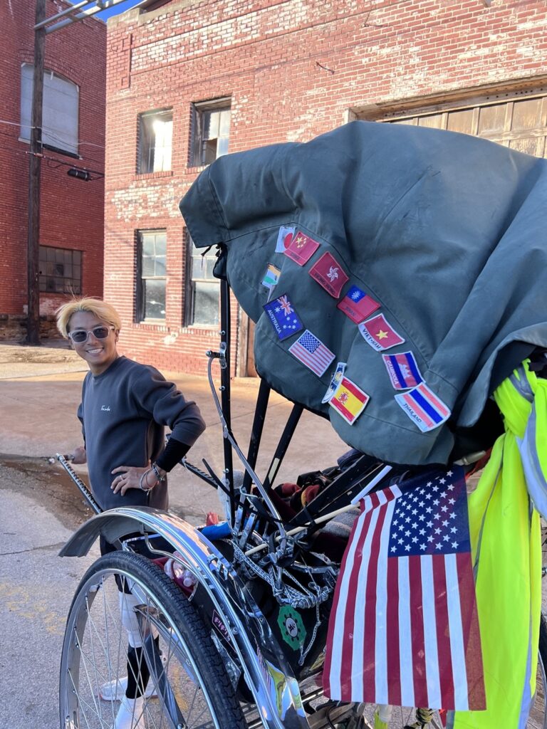 Man running cross-country with a rickshaw strolls through Sapulpa ...